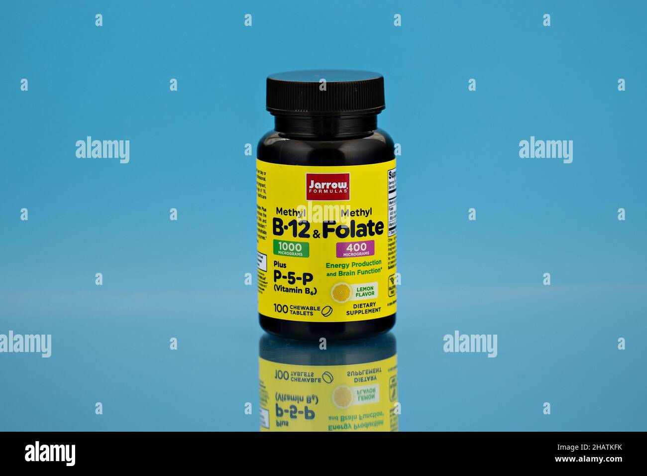 methyl folate and methyl b-12 chewable tablets in the jar. dietary ...