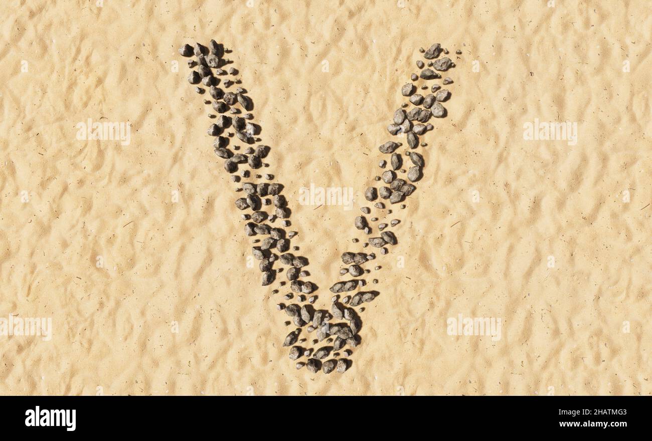 Concept or conceptual stones on beach sand handmade symbol shape ...