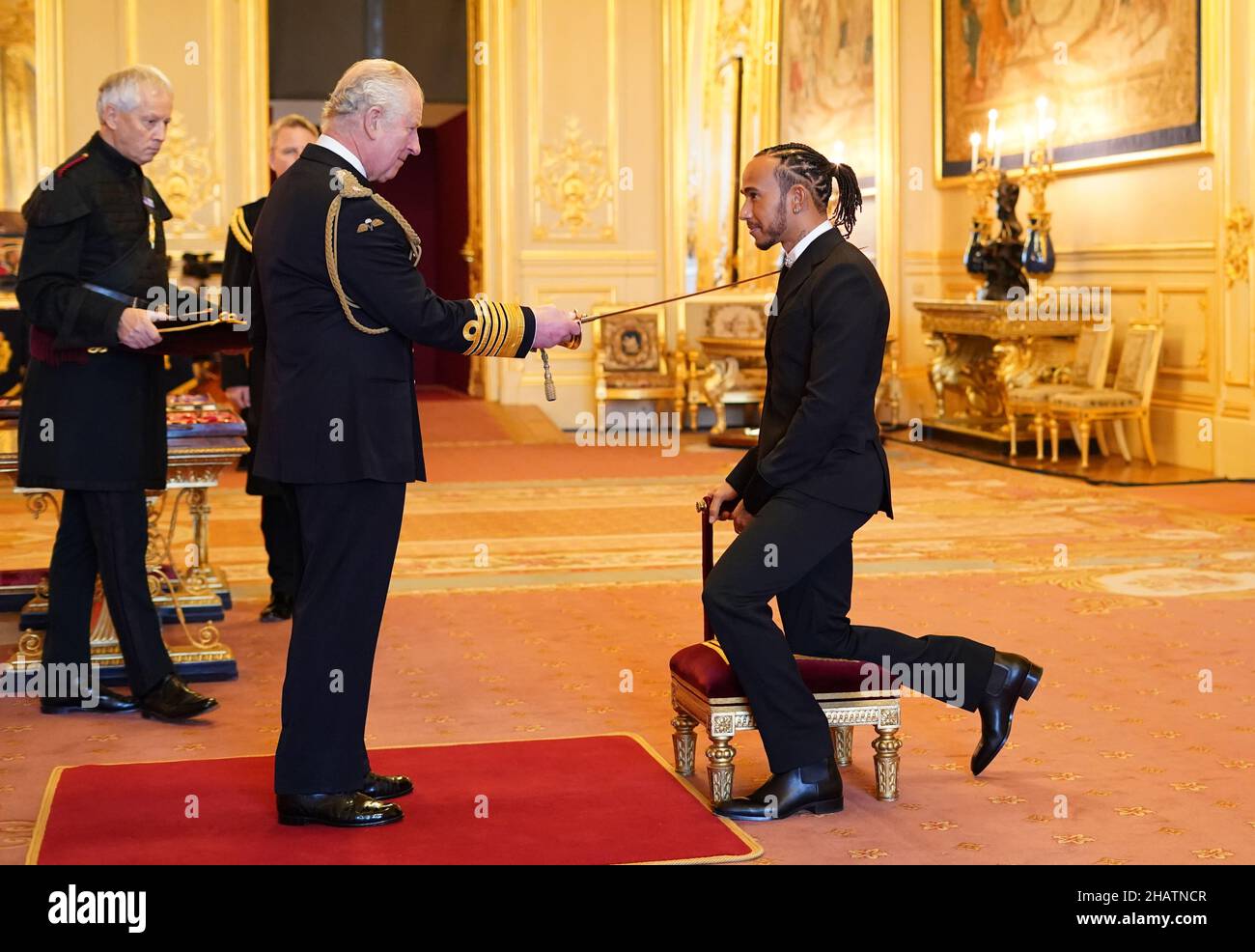 Sir Lewis Hamilton is made a Knight Bachelor by the Prince of Wales at ...