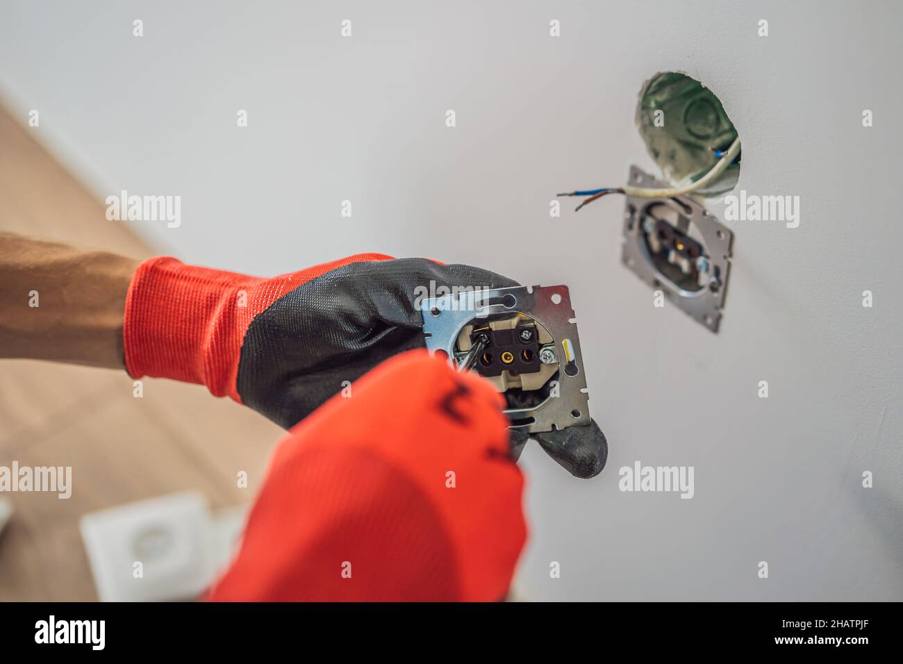 Male hands electrician installing hi-res stock photography and images ...