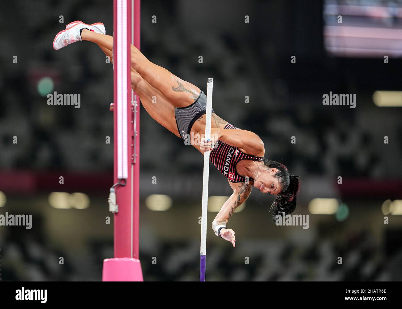 Anicka Newell participating in the Tokyo 2020 Olympics in the pole ...