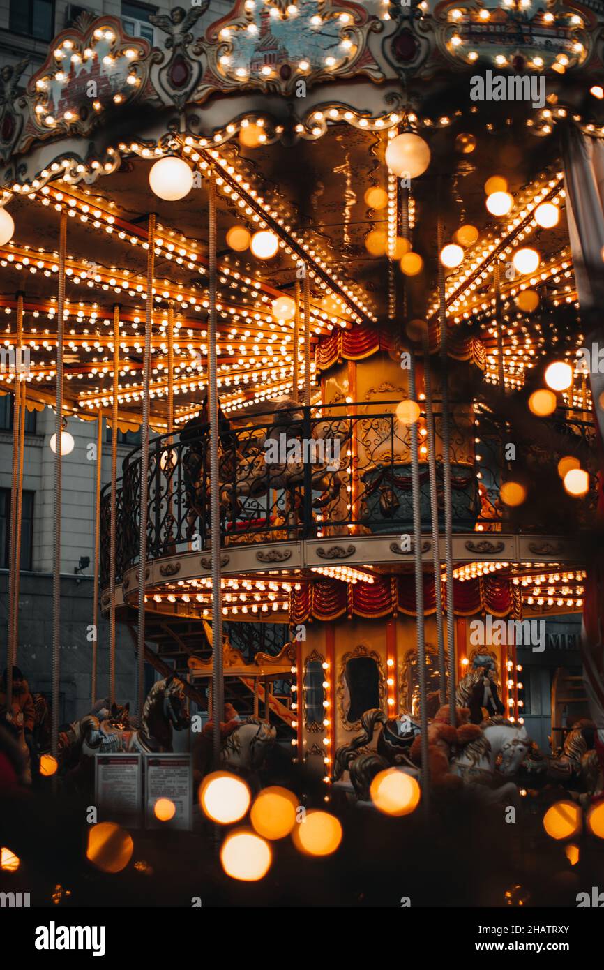 Shiny golden children's magic carousel with horses Merry-go-roundi n ...