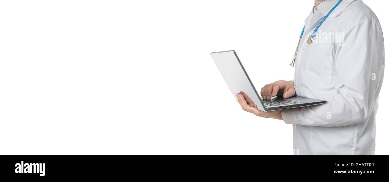 Medical doctor working on laptop online. doctor standing and typing at ...
