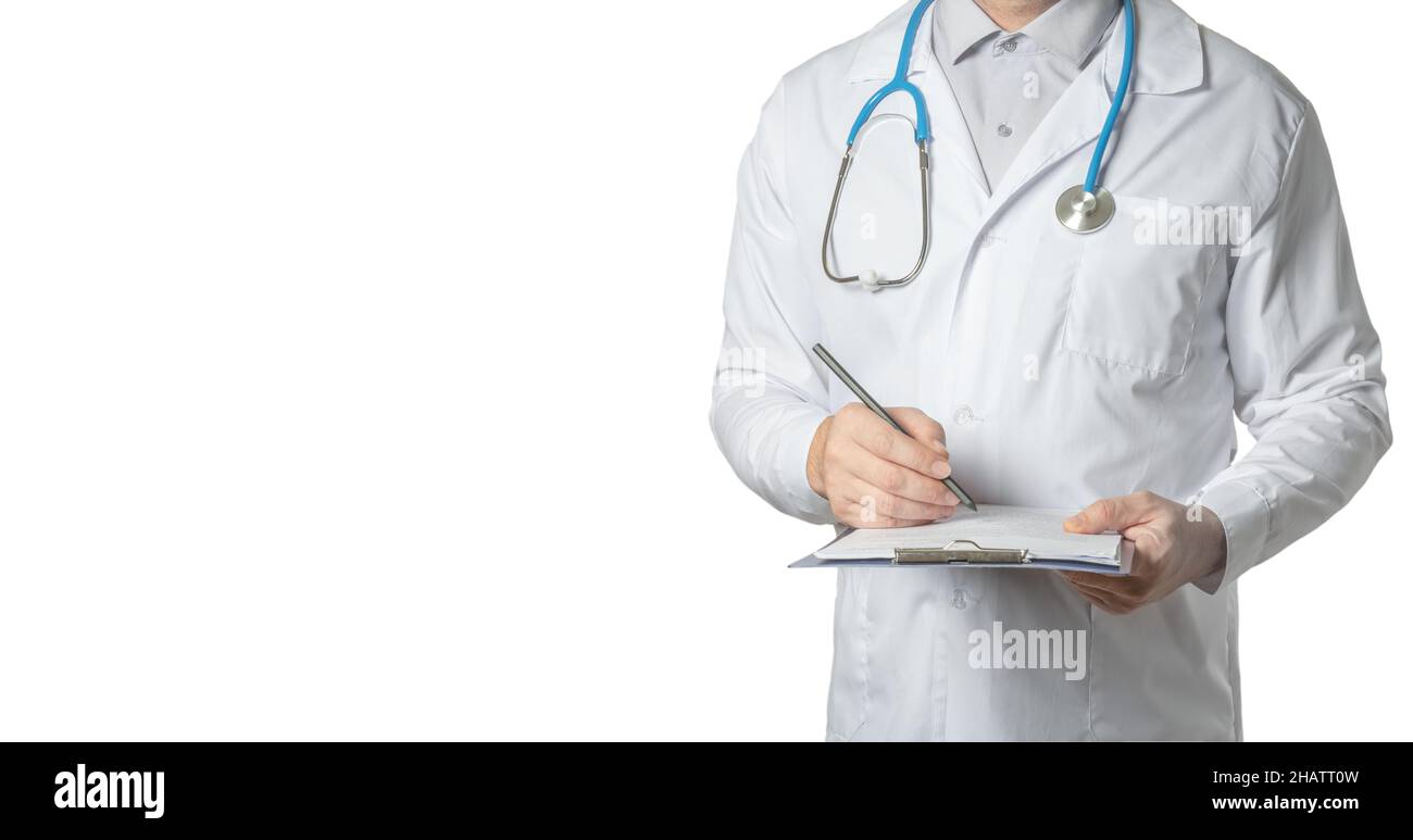 male doctor writing notes in medical journal. Doctor standing in office ...