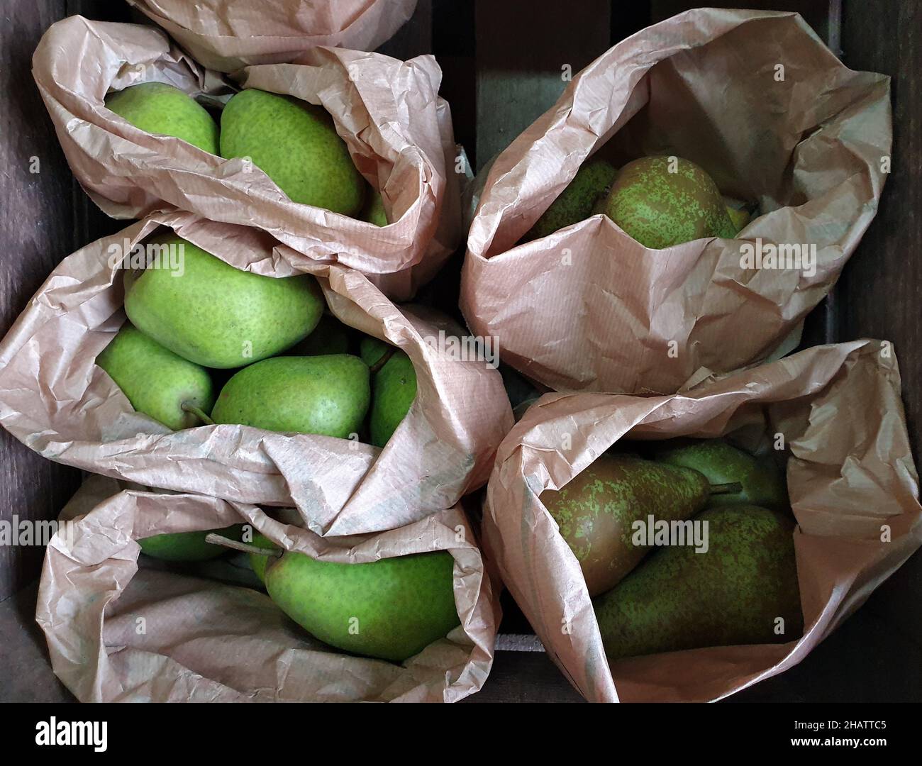 Five Brown Paper Bag Filled With Green Pears Stock Photo - Alamy