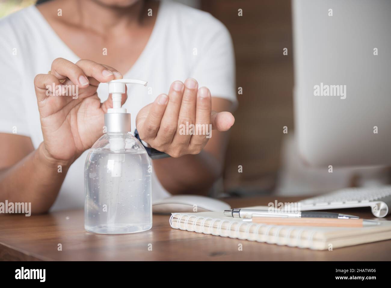 Female washing hand by sanitizer gel for prevention coronavirus disease ...