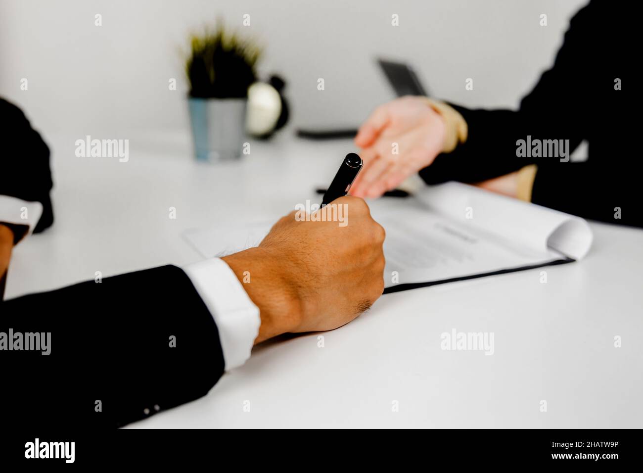 Close up hand sign, Bank agency explain and employee signing contract ...