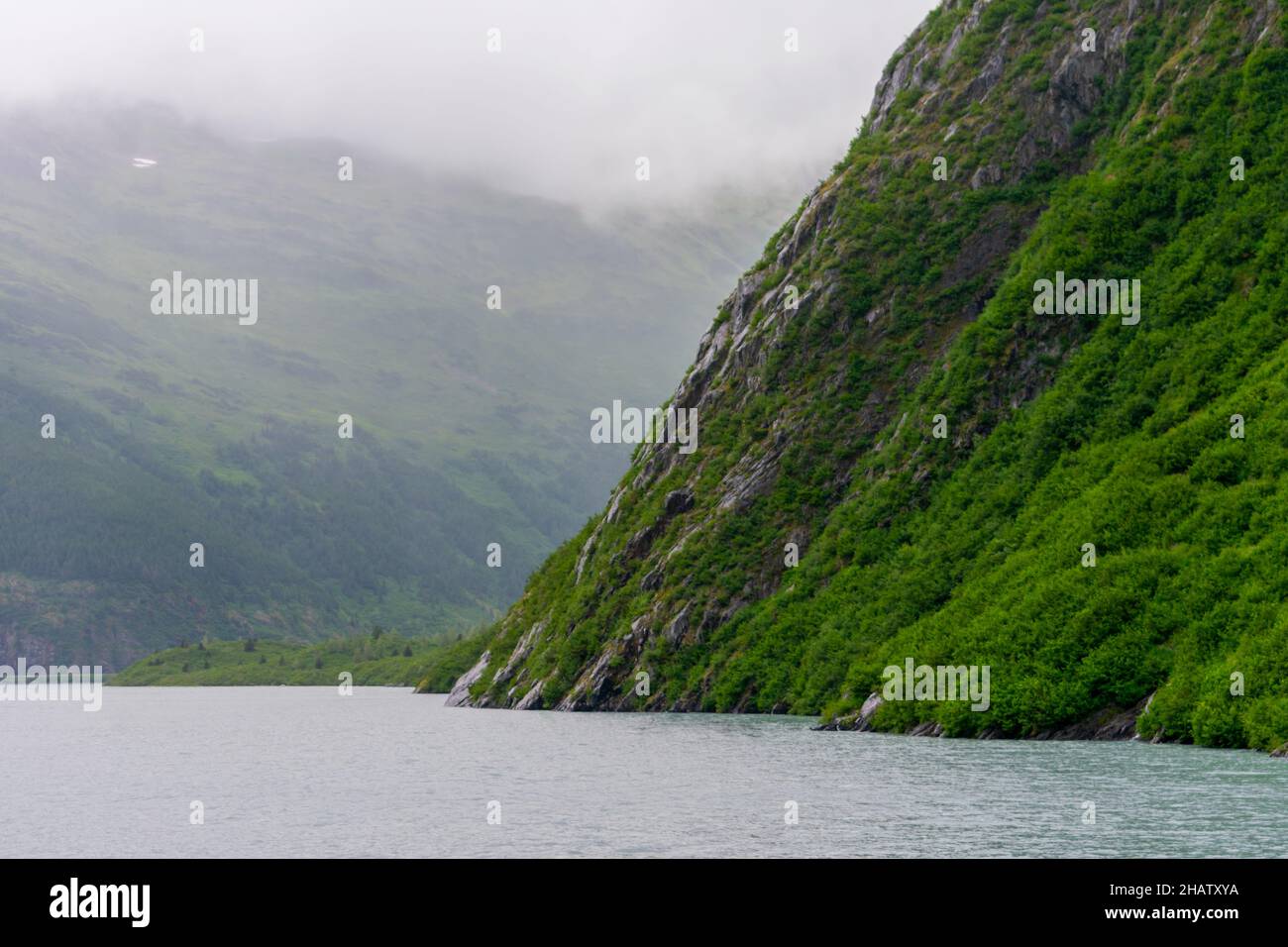 View of the slope of the mountain and the lake Stock Photo - Alamy