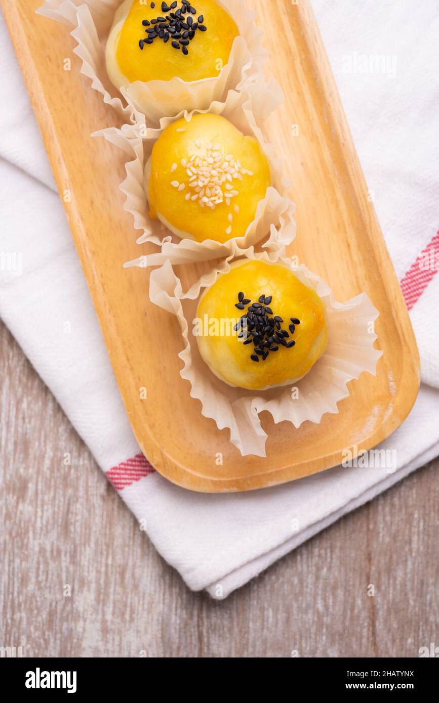 Chinese pastry bakery topping with black and white sesame seeds on ...