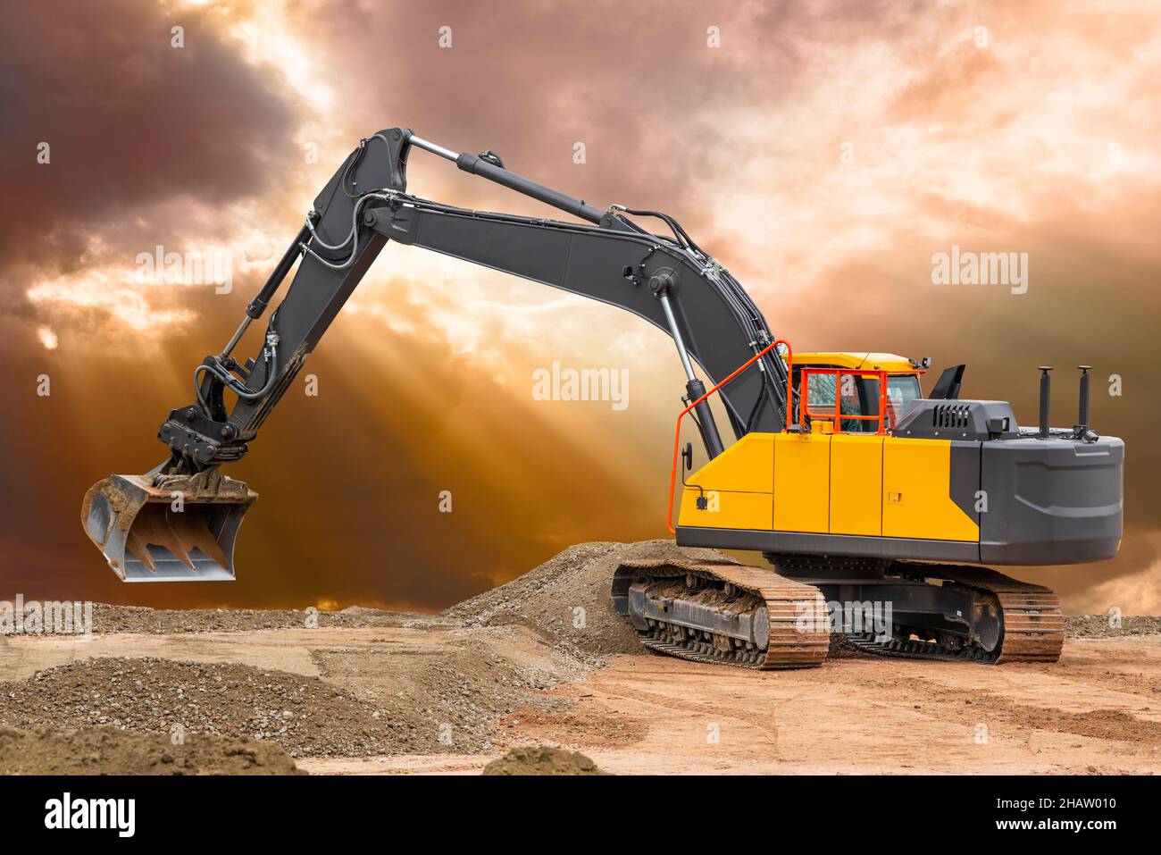 digger and excavator at work in construction site Stock Photo - Alamy