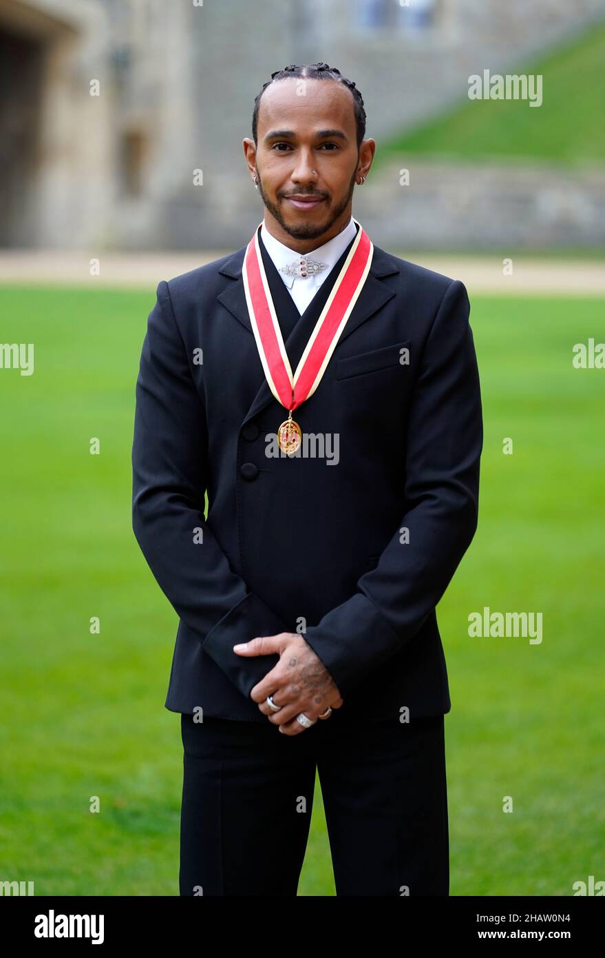 Sir Lewis Hamilton after he was made a Knight Bachelor by the Prince of ...