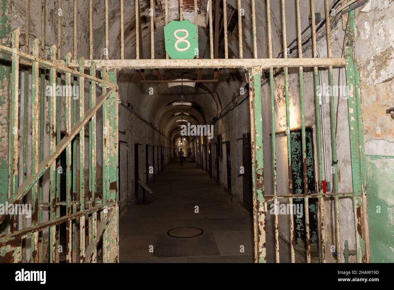 Entrance of an old prison with rusted railings Stock Photo - Alamy