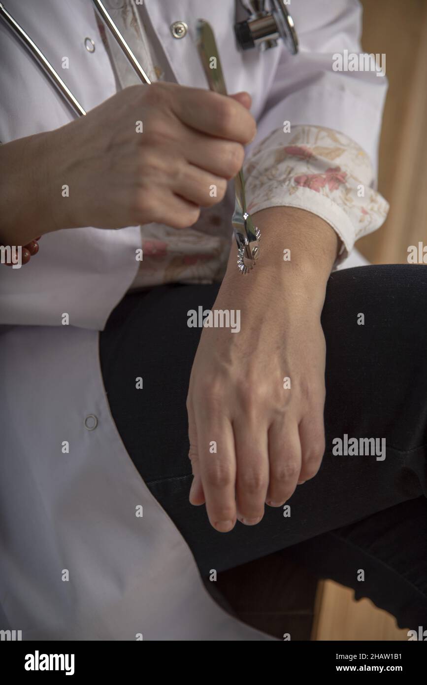 The doctor shows the patient how sensitivity is determined by the ...