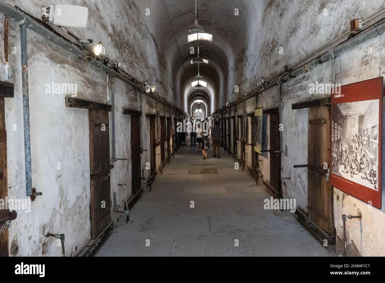 Corridor in an old prison Stock Photo - Alamy