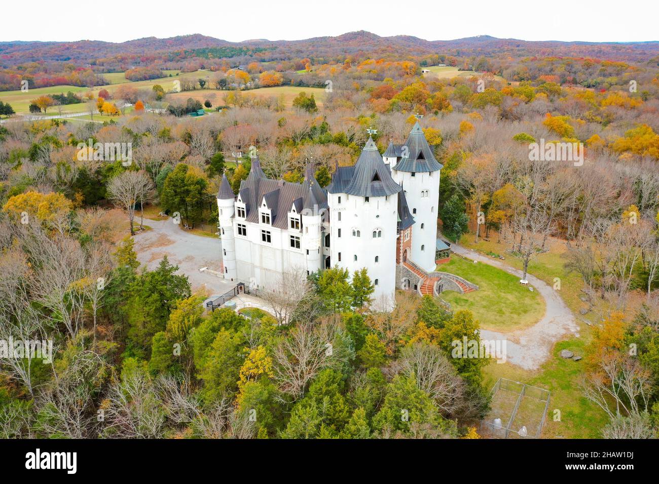 Aerial view of an old castle in an autumn forest Stock Photo - Alamy