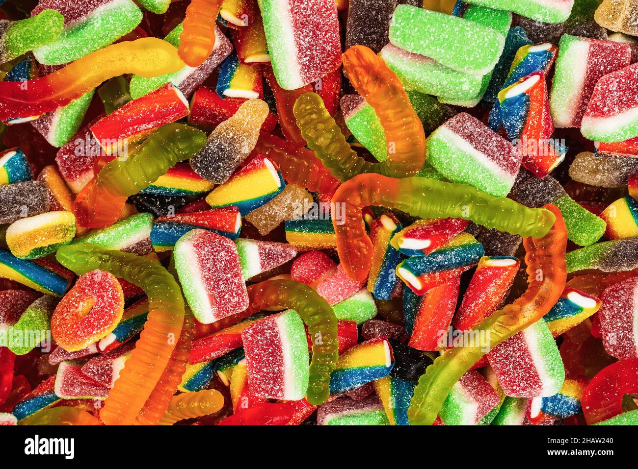 Assorted tasty gummy candies. Top view. Jelly sweets background Stock ...