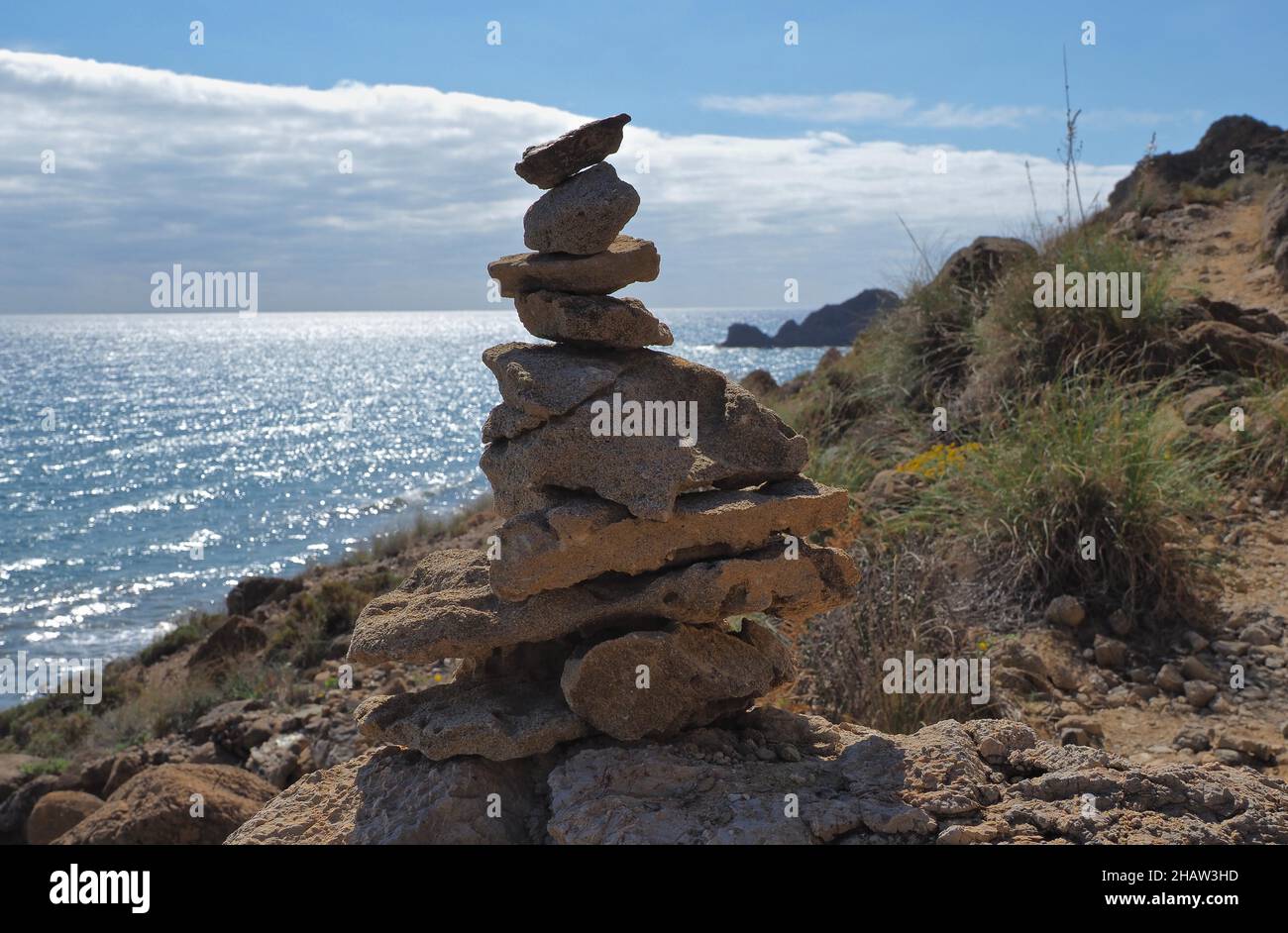 Stacked stones on the hiking trail from San Juan de los Terreros to ...