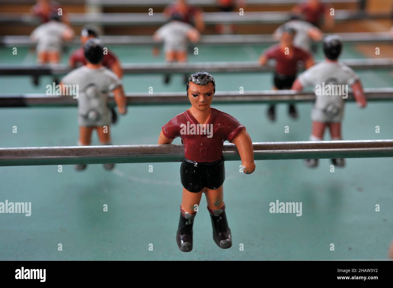 Figures on poles from table football Stock Photo - Alamy