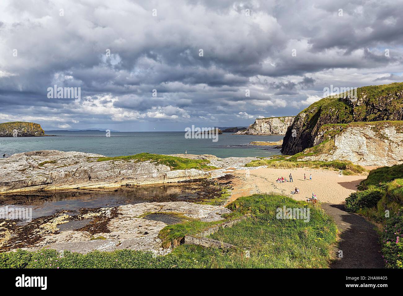 Rocky coast, cliffs, small sandy beach, Ballintoy, Antrim, Northern ...