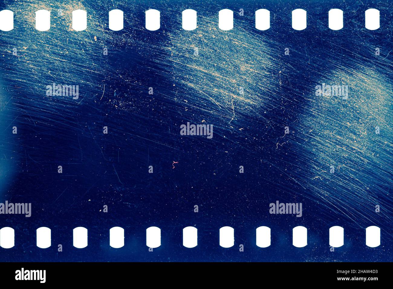 Dusty and grungy 35mm film texture or surface. Perforated scratched ...