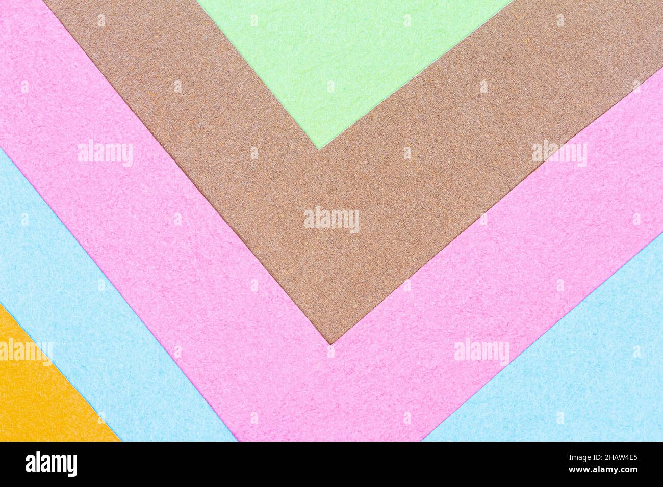 Multicolor background from a paper of different colors. Abstract ...