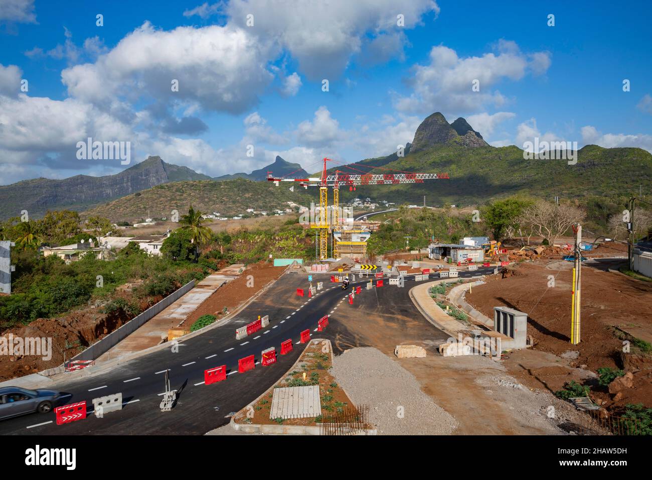 Road and bridge construction with crane in the city of Beau Bassin, in ...