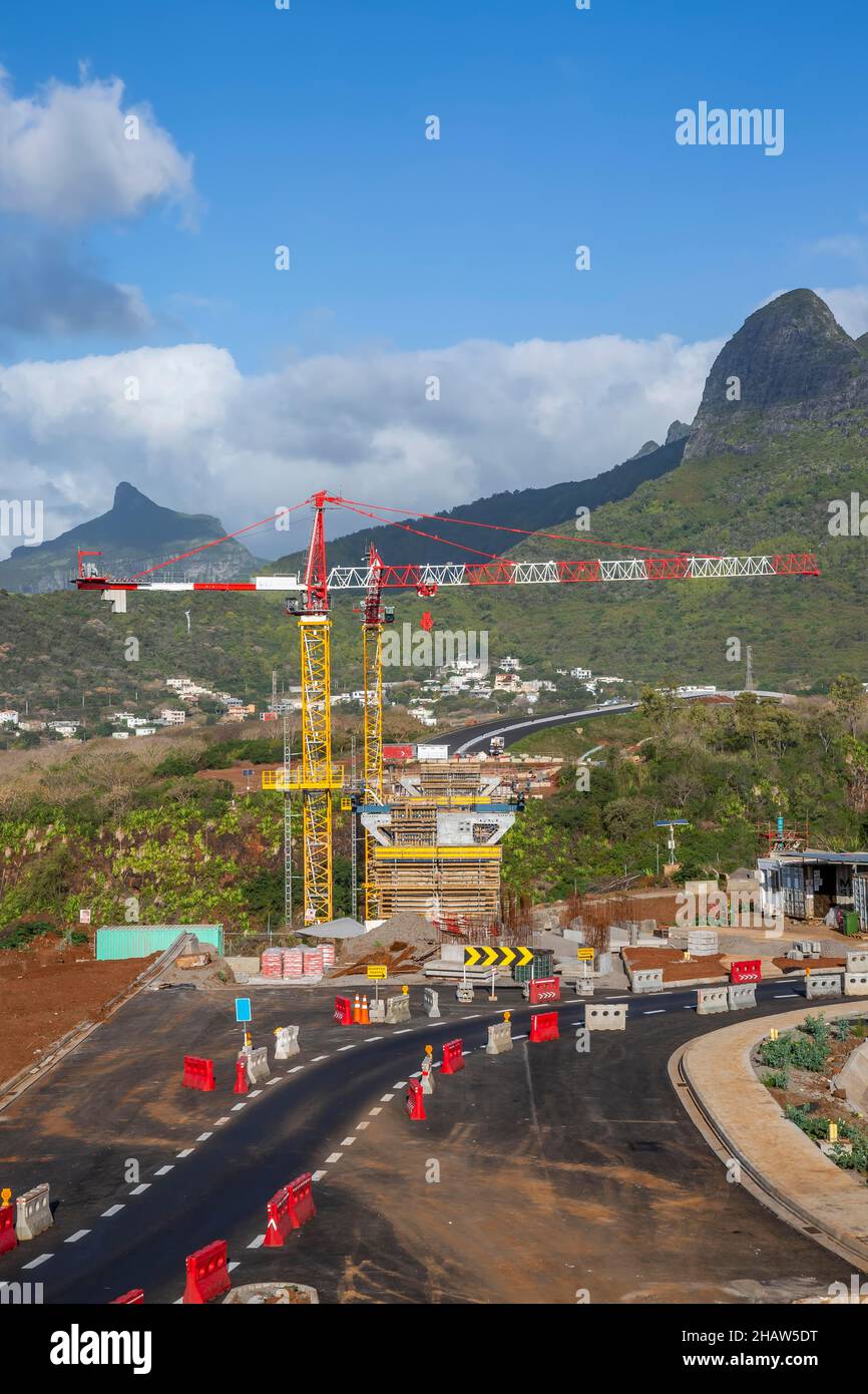 Road and bridge construction with crane in the city of Beau Bassin, in ...
