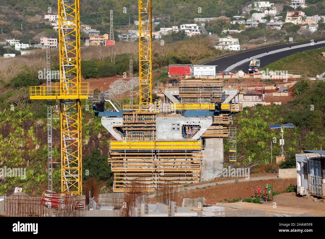 Road and bridge construction with crane in the city of Beau Bassin, in ...