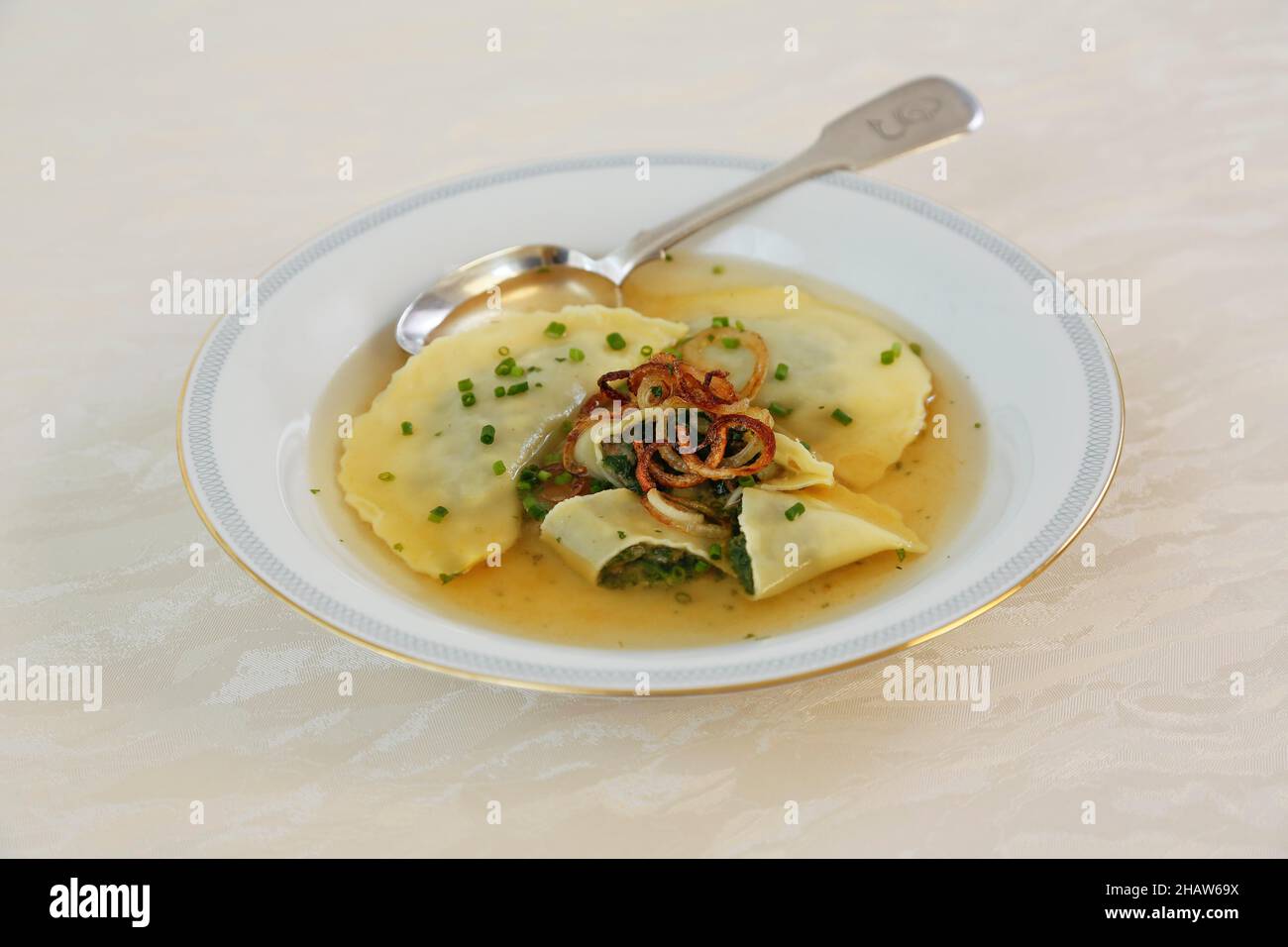 Swabian cuisine, Maultaschen in broth with stewed onion rings and ...