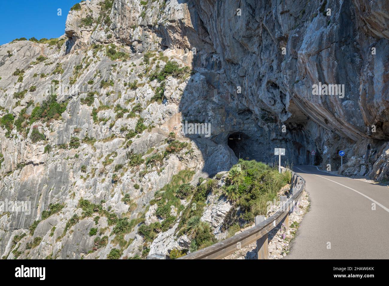Mountain road leads into narrow tunnel, Tramuntana Mountains, Majorca ...