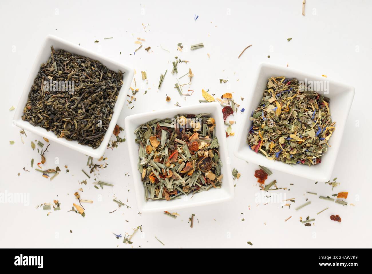 Concept of cooking tea with different types of tea on white background ...