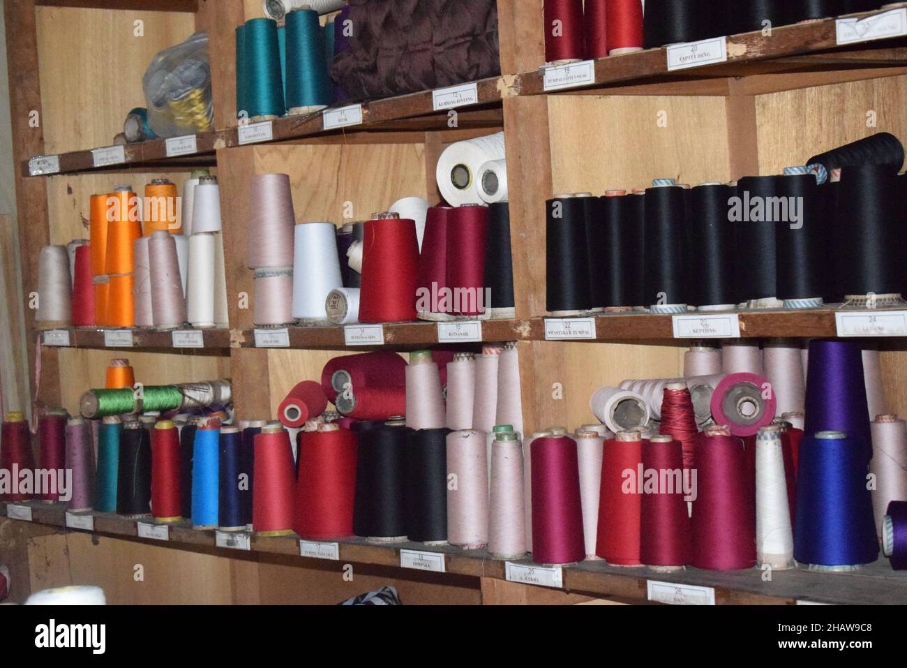 Old Indonesian textile factory. Threads Stock Photo - Alamy