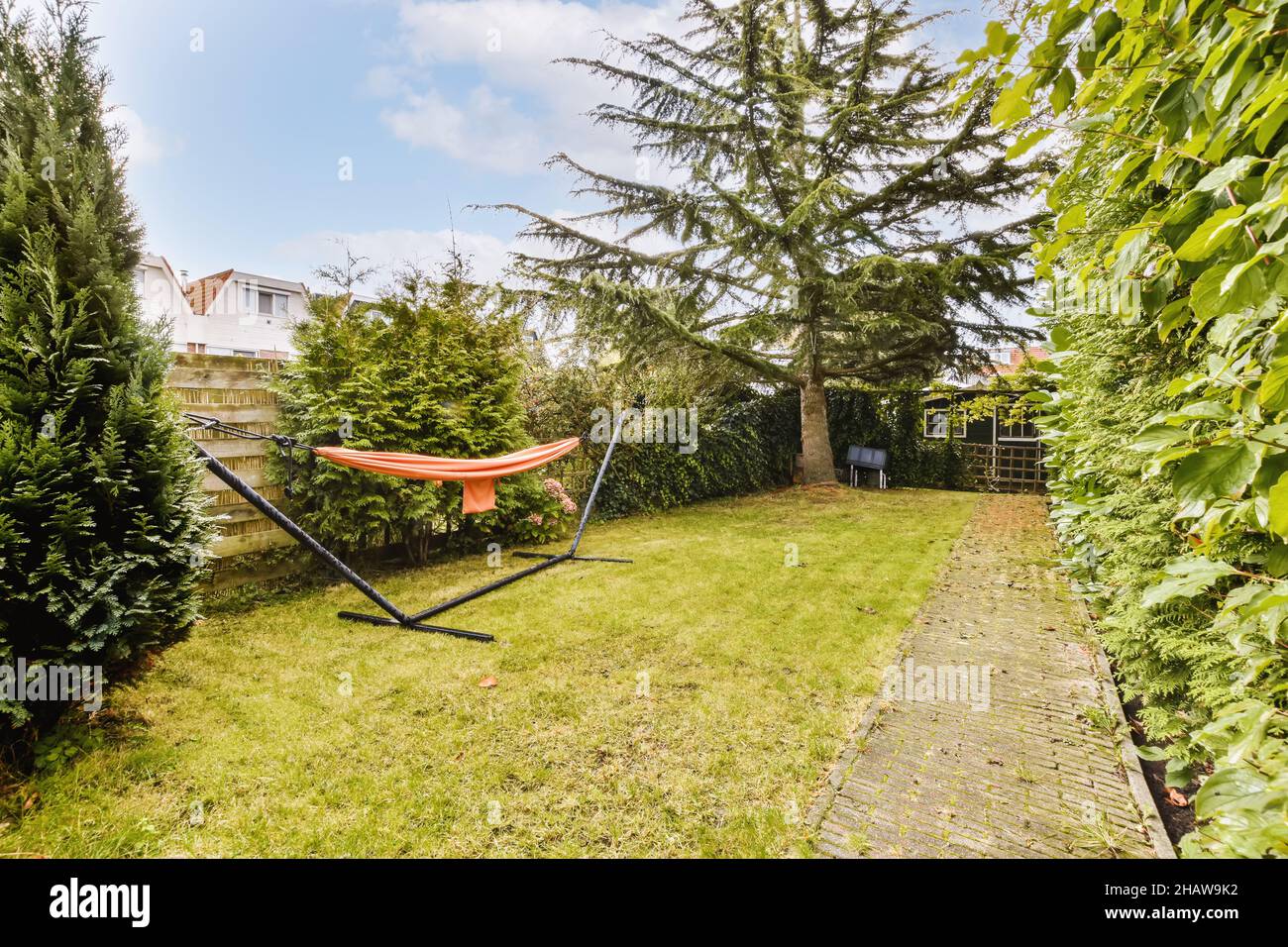 Superb courtyard with beautifully laid paths and trees Stock Photo - Alamy