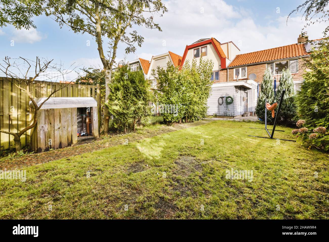 Superb courtyard with beautifully laid paths and trees Stock Photo - Alamy