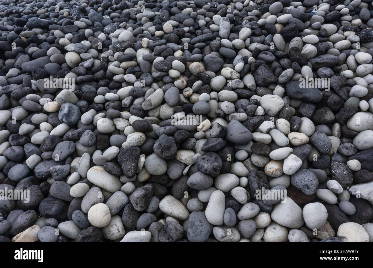 Drone shot, Large round stones on the beach of Rocha da Relva, Sao ...
