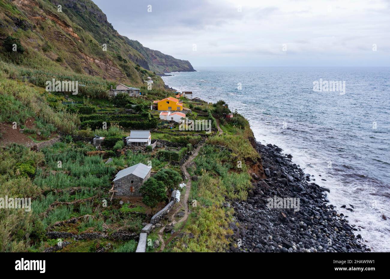Drone shot, view of the cliff and settlement of Rocha da Relva, Sao ...