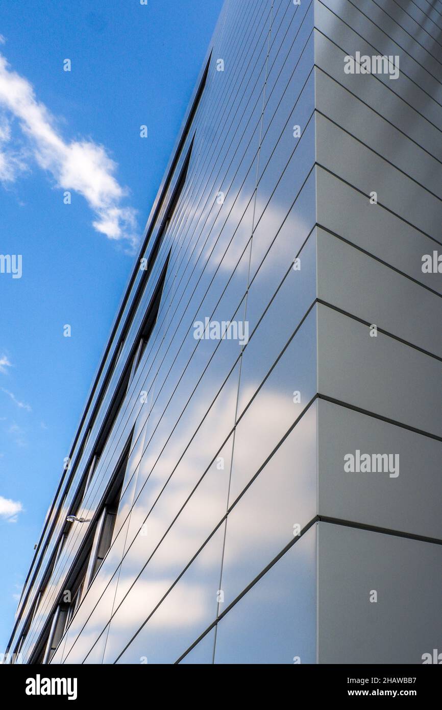 Low angle of a contemporary gray high rise building Stock Photo - Alamy