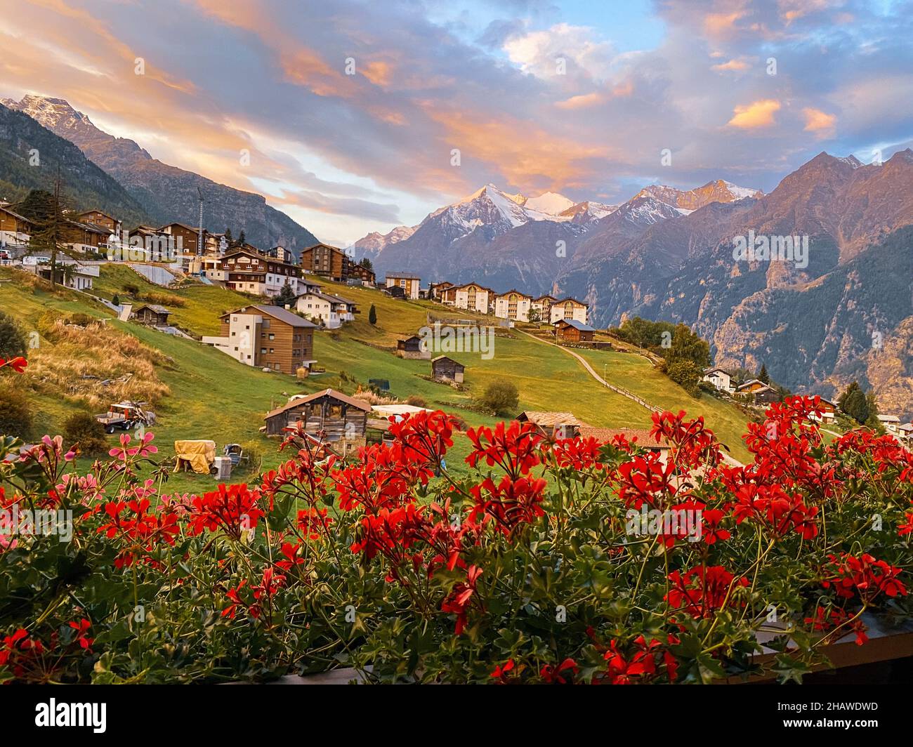 Beautiful view of a houses on a green land mountains view in the back ...