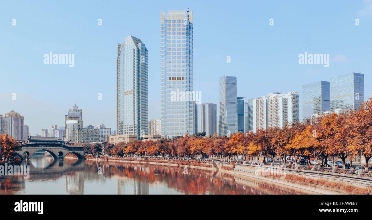 Autumn Scenery in Chengdu, Autumn trees lining the banks of the ...