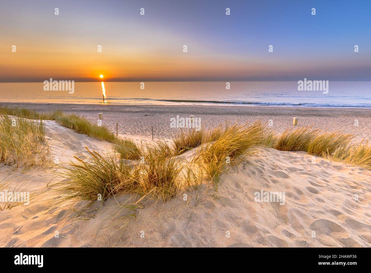 Sunset View over ocean from dune over North Sea and Canal in Ouddorp ...