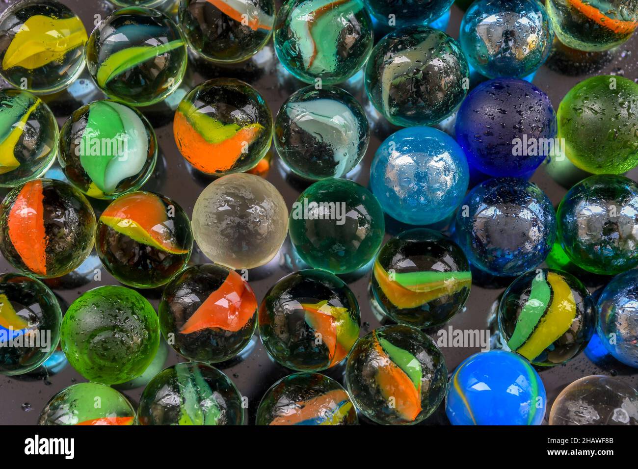 Group of wet colorful balls Stock Photo - Alamy