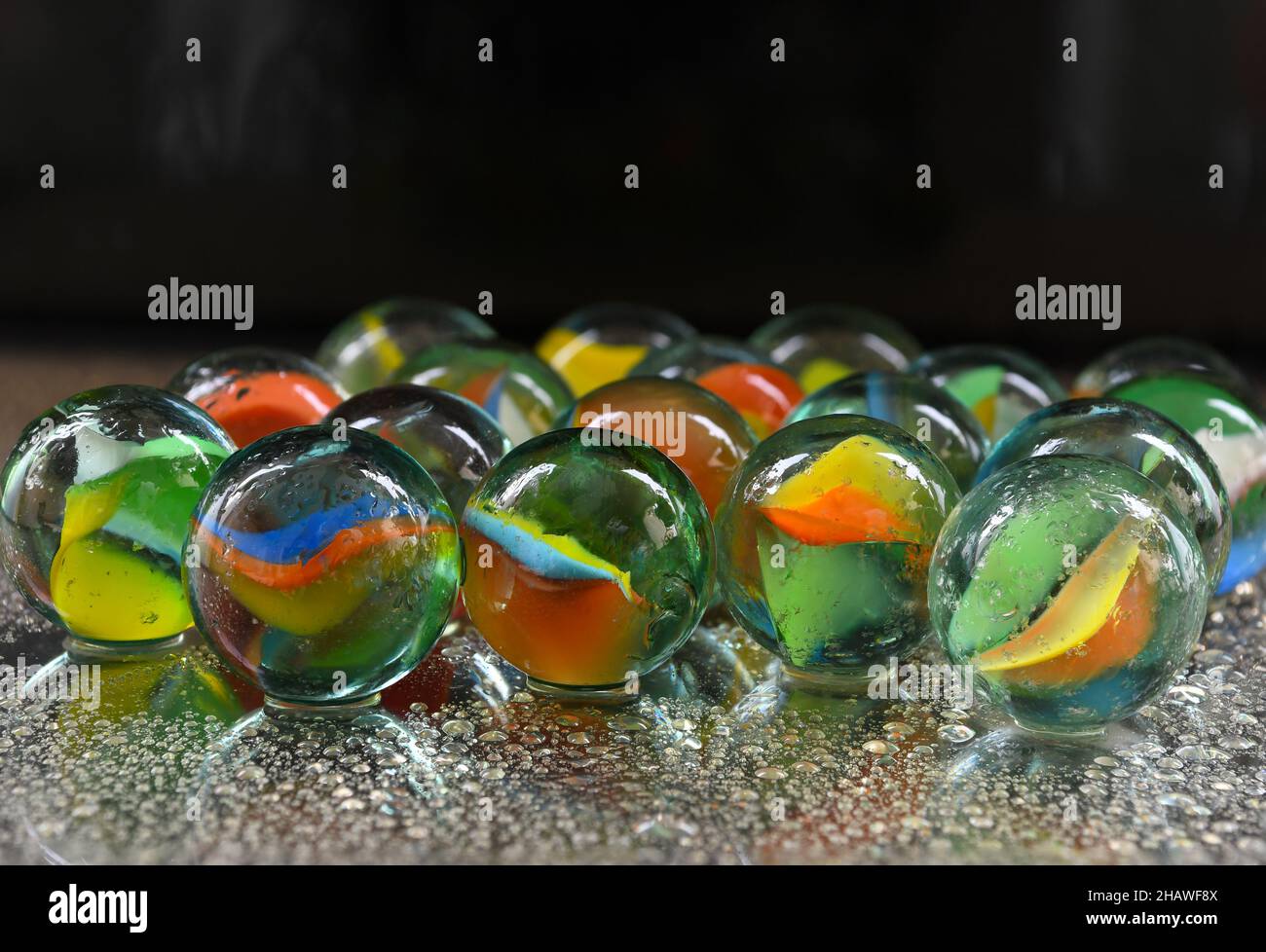 Group of wet colorful balls Stock Photo - Alamy