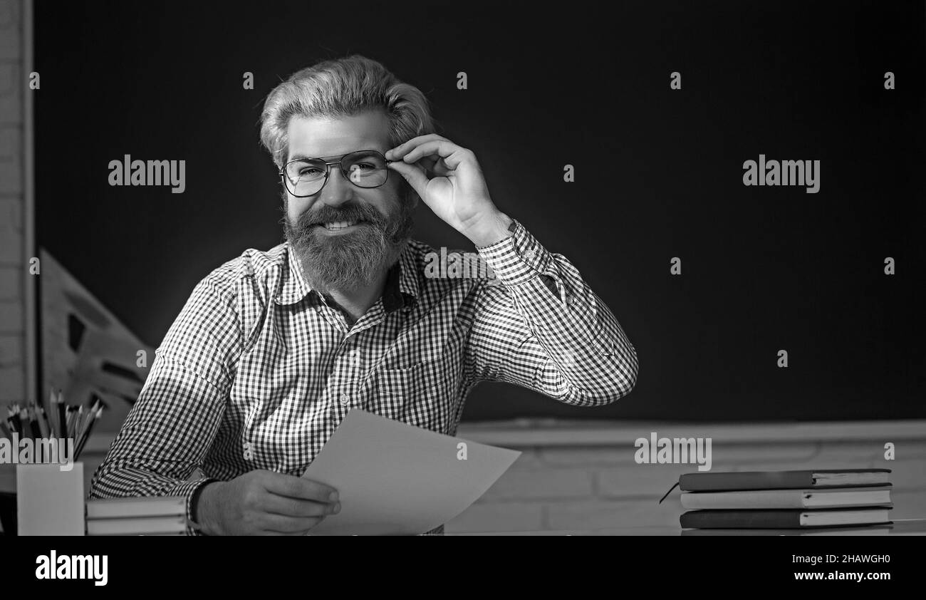 Senior bearded man holding Black and White Stock Photos & Images - Alamy