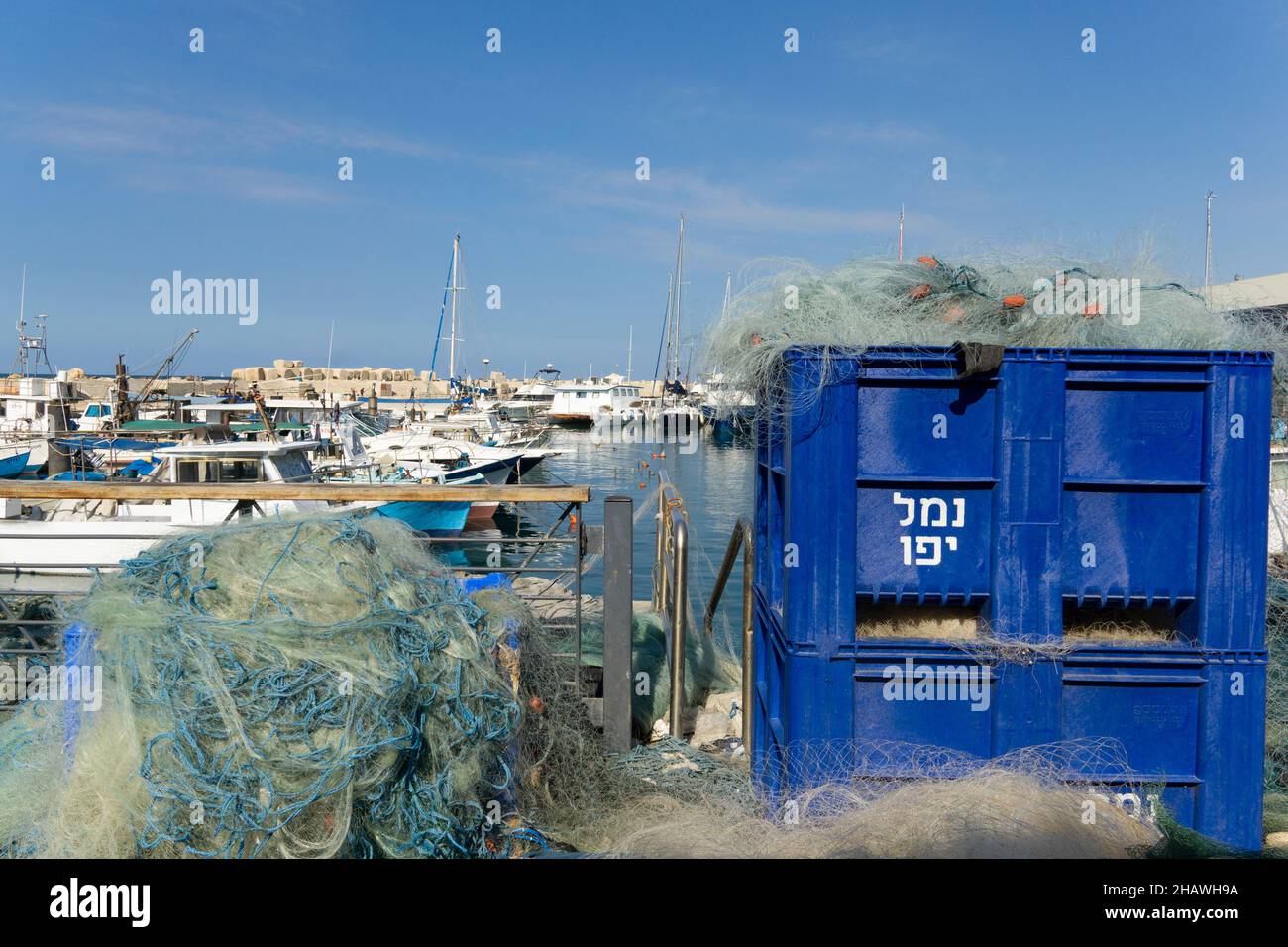 Fishing nets and fishing boats on Jaffa port in Tel-aviv, Israel Stock ...