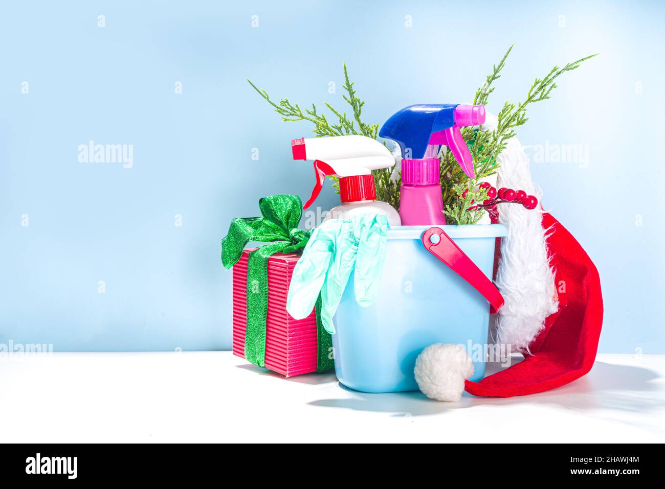 Christmas cleaning concept. Various bottles, equipment, and accessories ...