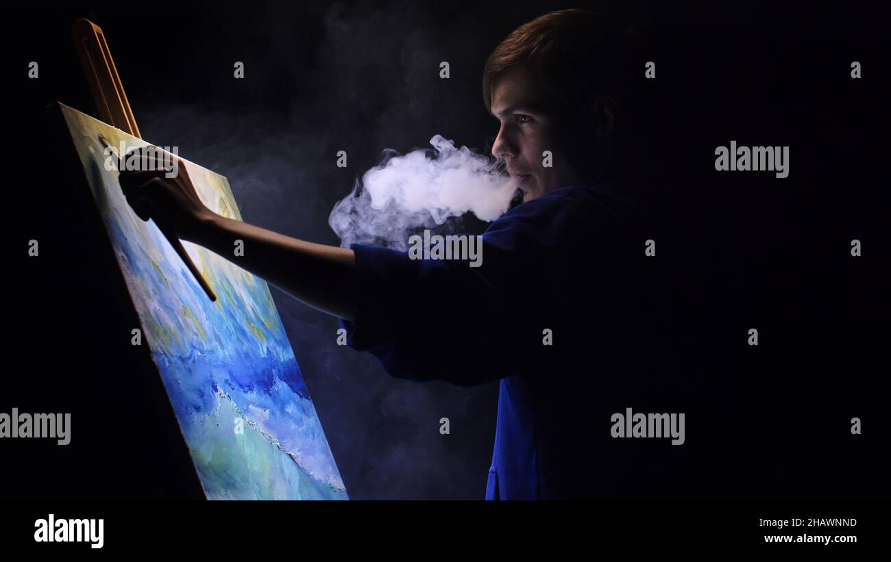 Artist copyist paint seascape with ship in ocean. Vaper smoke vape e ...