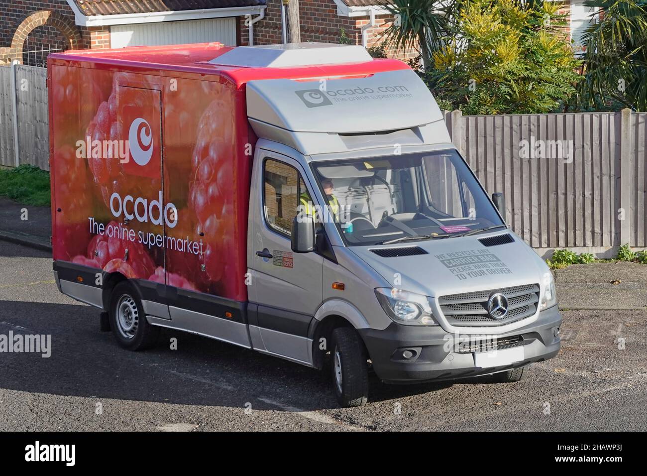 Side & front view looking down on red Mercedes Ocado online grocery ...