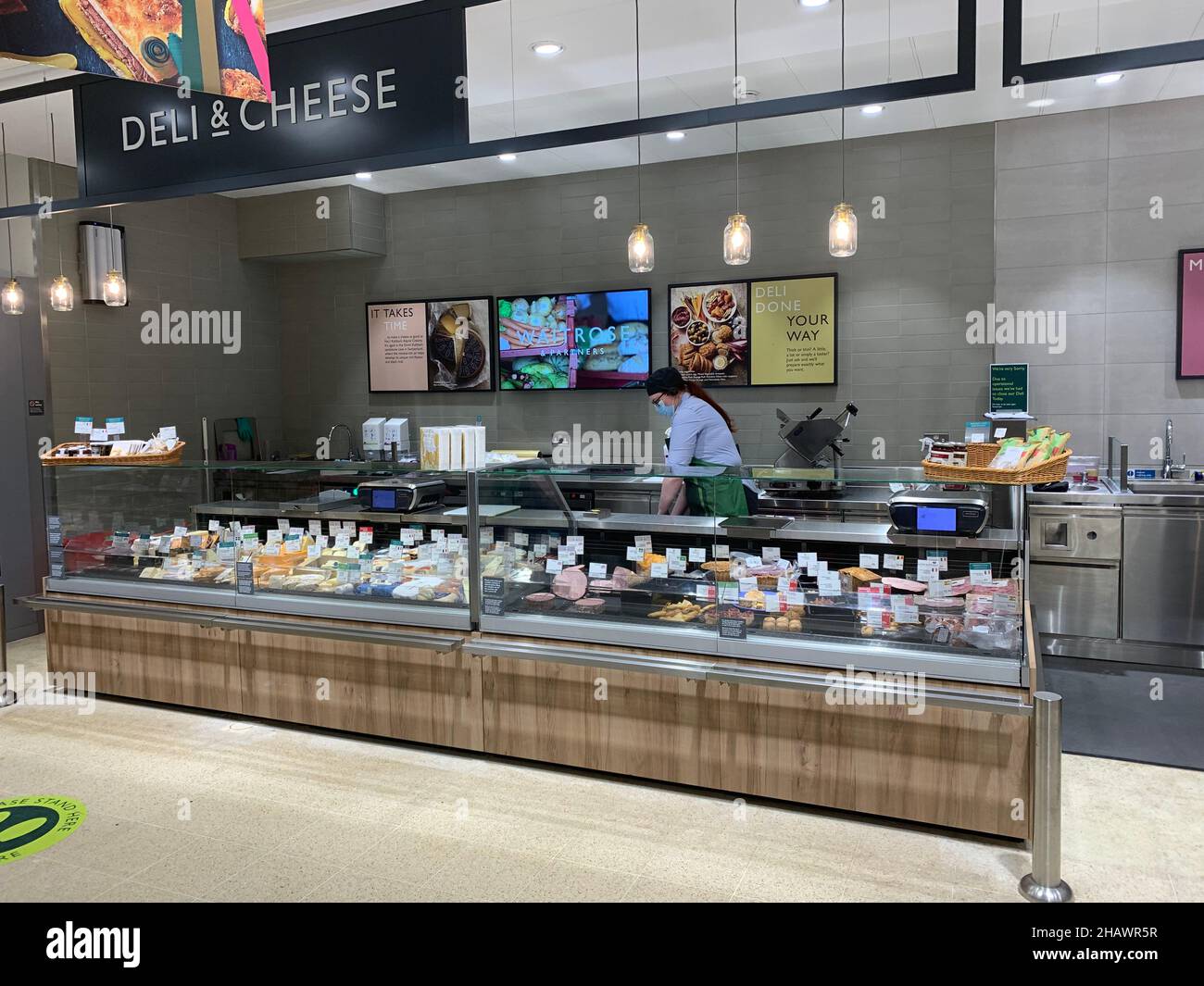 Deli and cheese at Waitrose Kingsthorpe Northampton UK food slicer ...