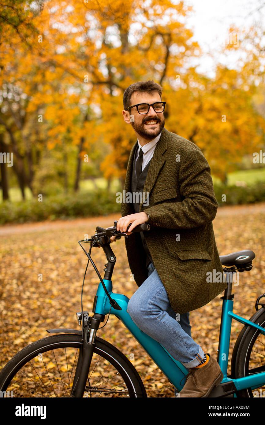Young man green bicycle hi-res stock photography and images - Alamy