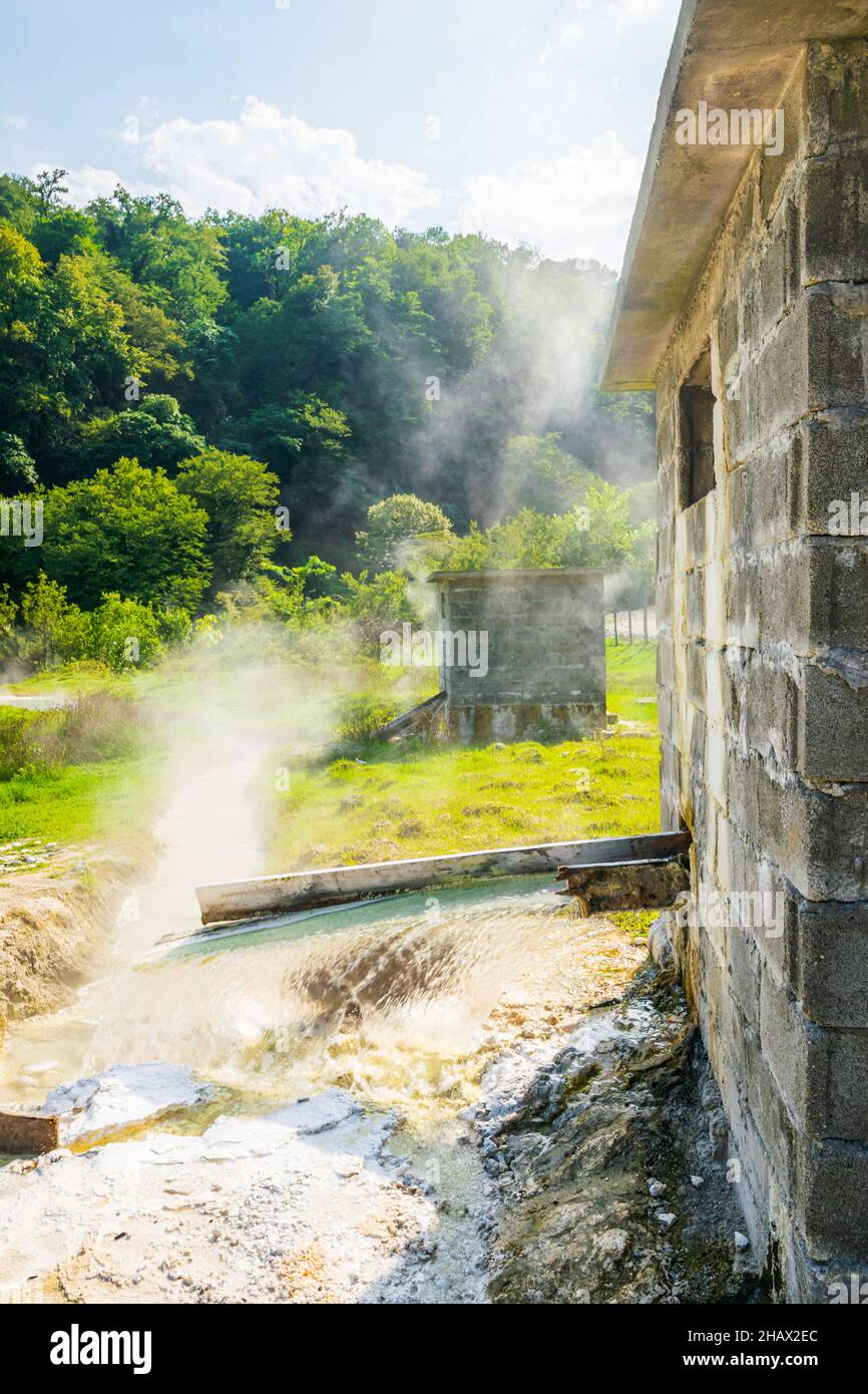 Close up of steaming hot springs in a sunny summer day in picturesque ...